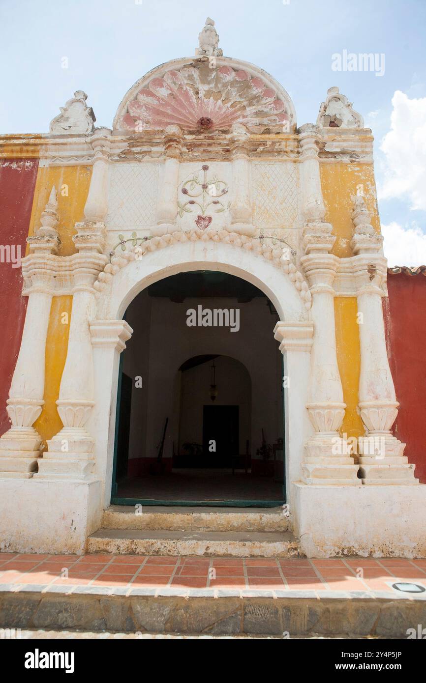 Beautiful South American colonial church with a vibrant yellow façade ...