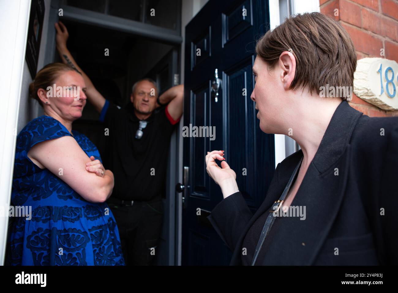Jess Phillips whilst canvassing talks with Samantha and John Fraser-Morris at their home in ...