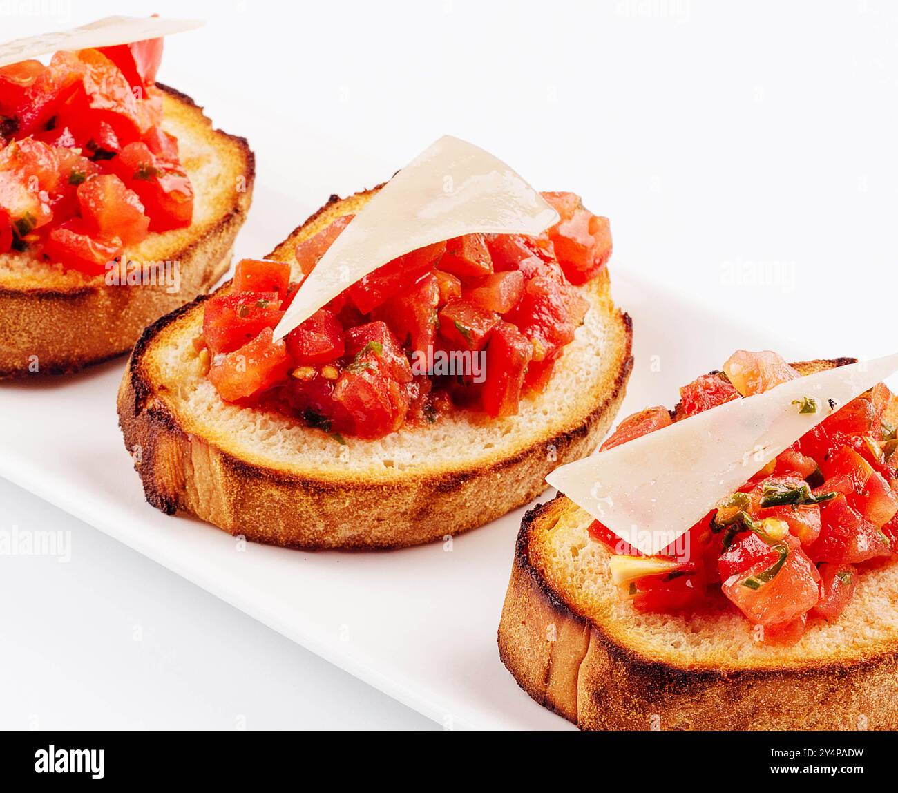 Traditional italian antipasto bruschetta appetizer with cherry tomatoes ...
