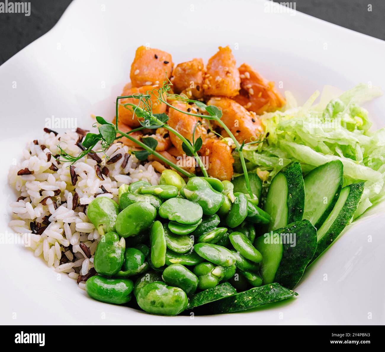 Hawaiian salmon poke salad with rice closeup Stock Photo - Alamy
