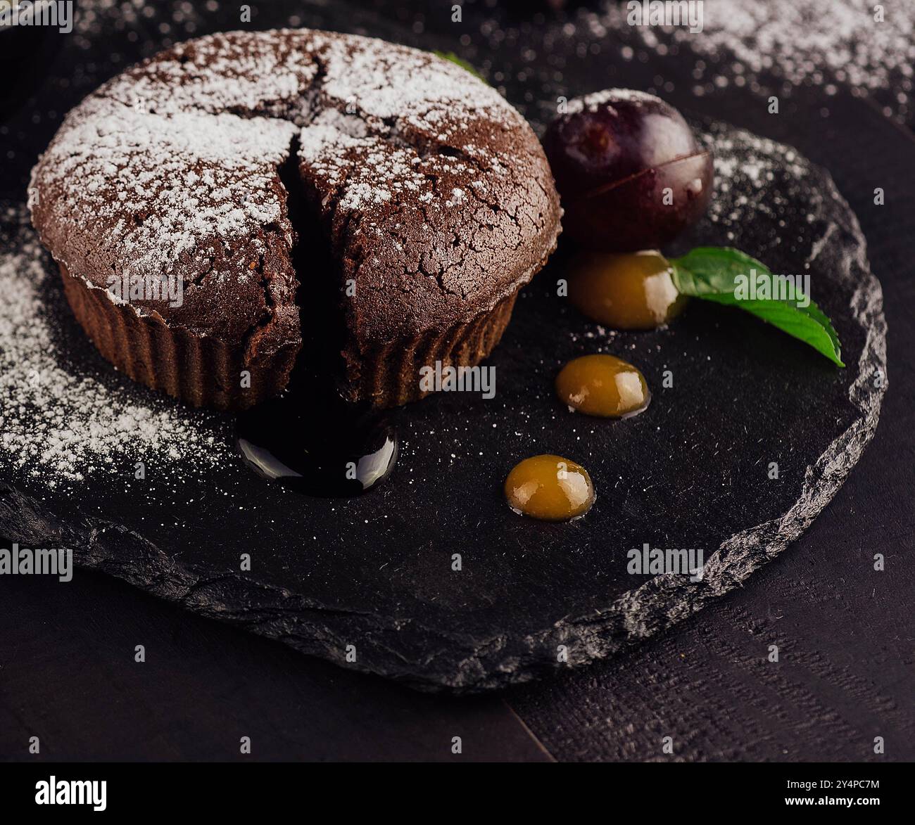 Delicious molten chocolate lava cake with vanilla ice cream Stock Photo ...