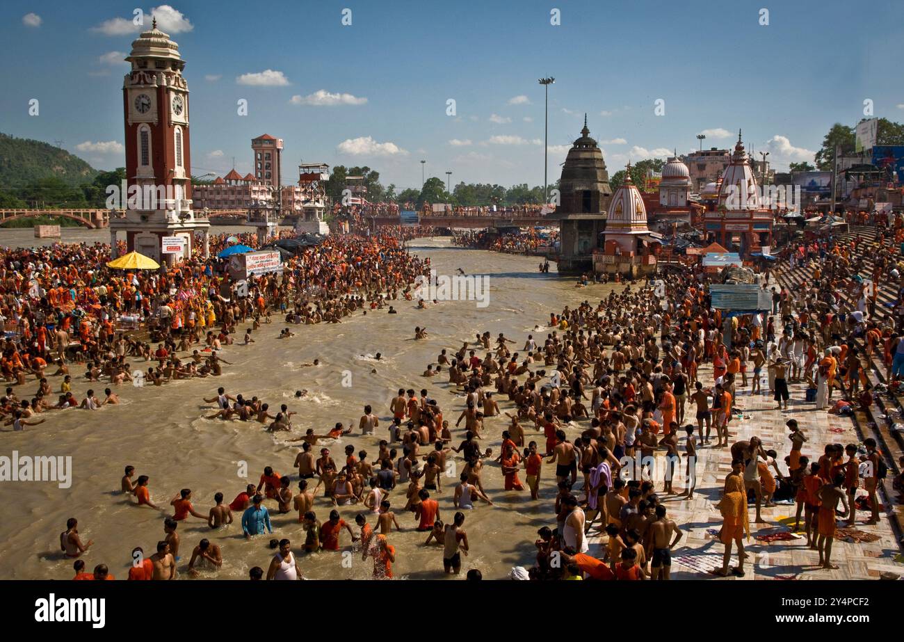 Monsoon rains and pilgrims and cremation rituals by the River Ganges ...