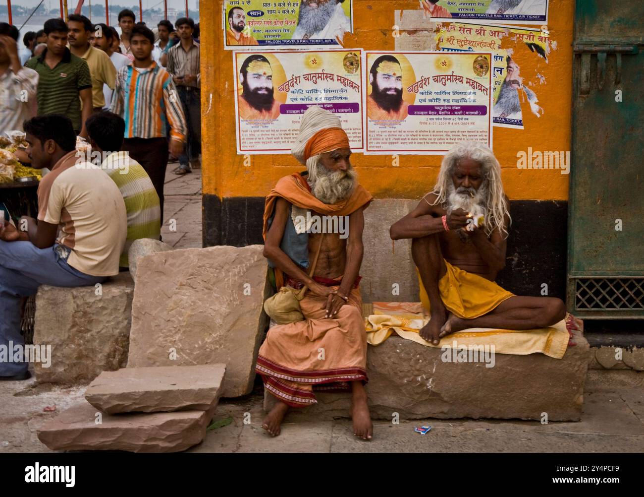 Monsoon rains and pilgrims and cremation rituals by the River Ganges ...