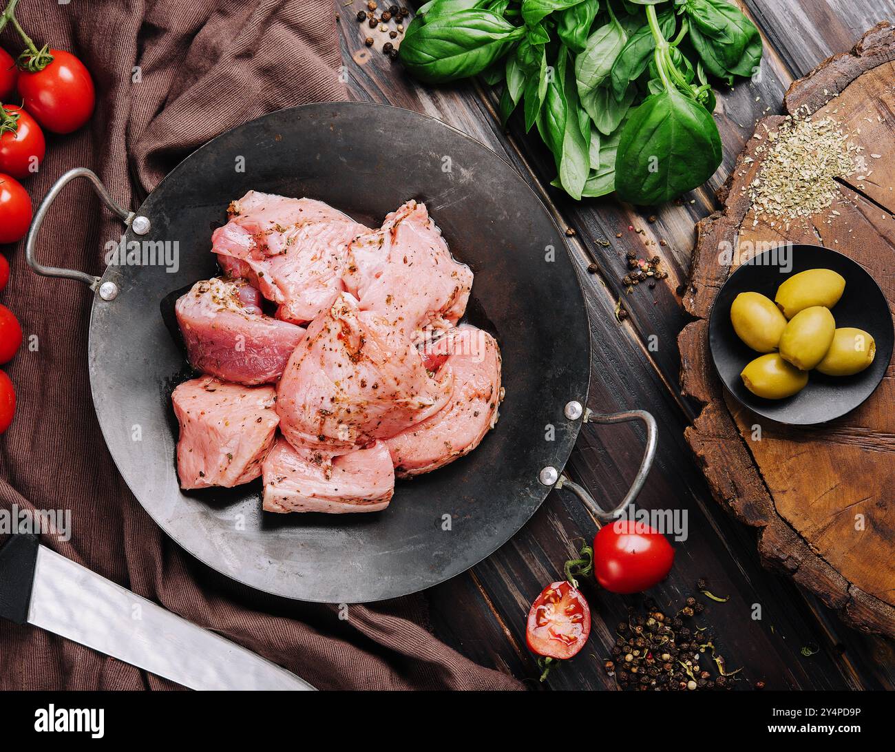 Raw pork meat heap for roast on pan Stock Photo - Alamy