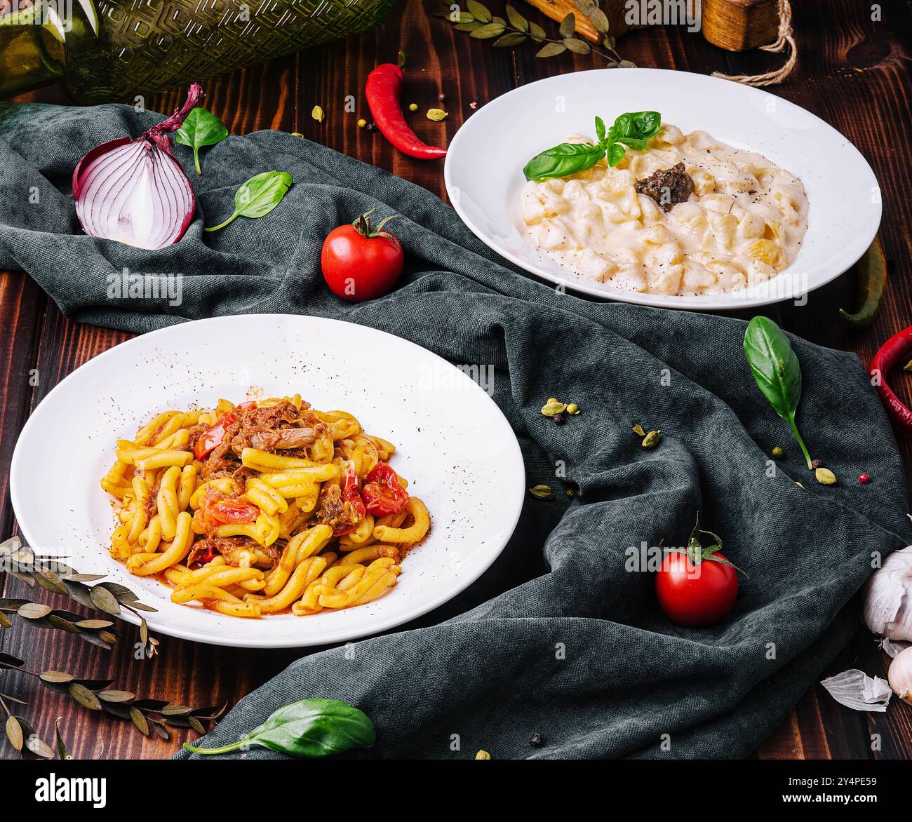 different types of italian pasta in plates Stock Photo - Alamy