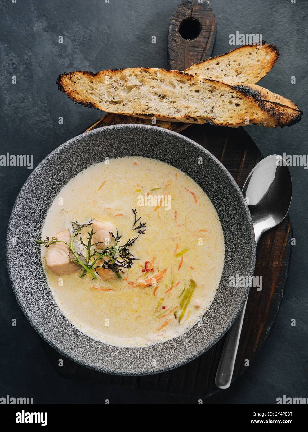 Salmon soup. creamy hearty salmon fish soup Stock Photo - Alamy