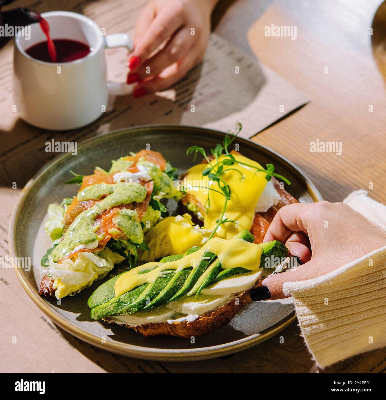 girls have breakfast in a cafe Stock Photo - Alamy