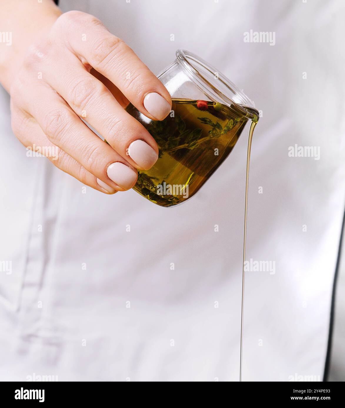 Close up chef pouring olive hi-res stock photography and images - Alamy