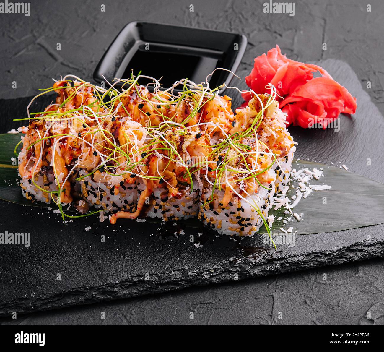 Beautiful spicy special volcano sushi roll Stock Photo - Alamy
