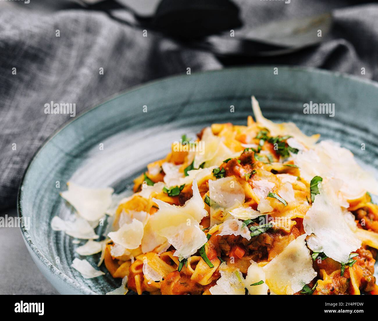 Tagliatelle with ragu bolognese sauce with parmesan Stock Photo - Alamy