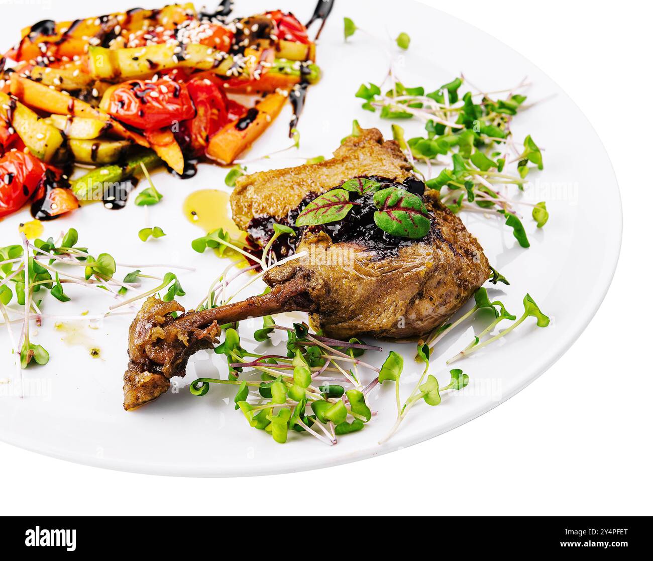 Roasted duck leg with grilled vegetables Stock Photo - Alamy