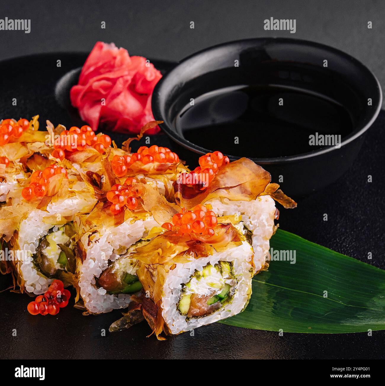 Sushi rolls with bonito flakes, tuna, cheese cream and cucumber Stock ...