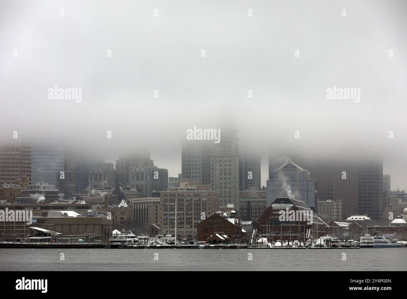 Fog hangs over the city skyline Boston Harbor Stock Photo - Alamy