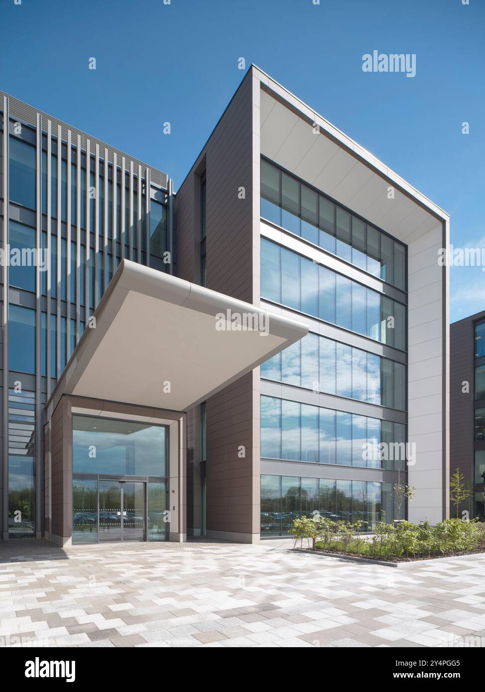 Front elevation with main entrance's protruding canopy. 400 Long Water ...