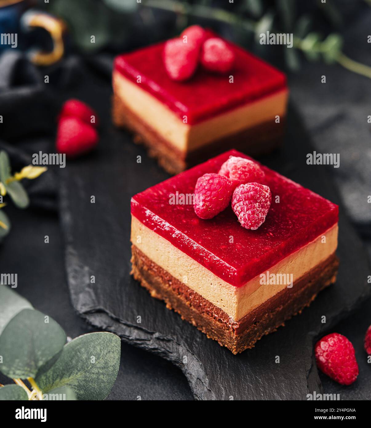 Delicious chocolate mousse cake with raspberries jelly Stock Photo - Alamy