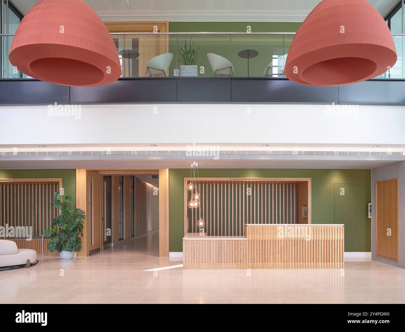 Double-height entrance lobby with reception desk. 400 Long Water ...