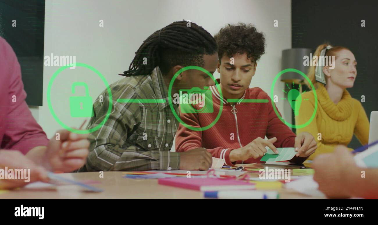 Image of media icons over diverse business people discussing work Stock ...