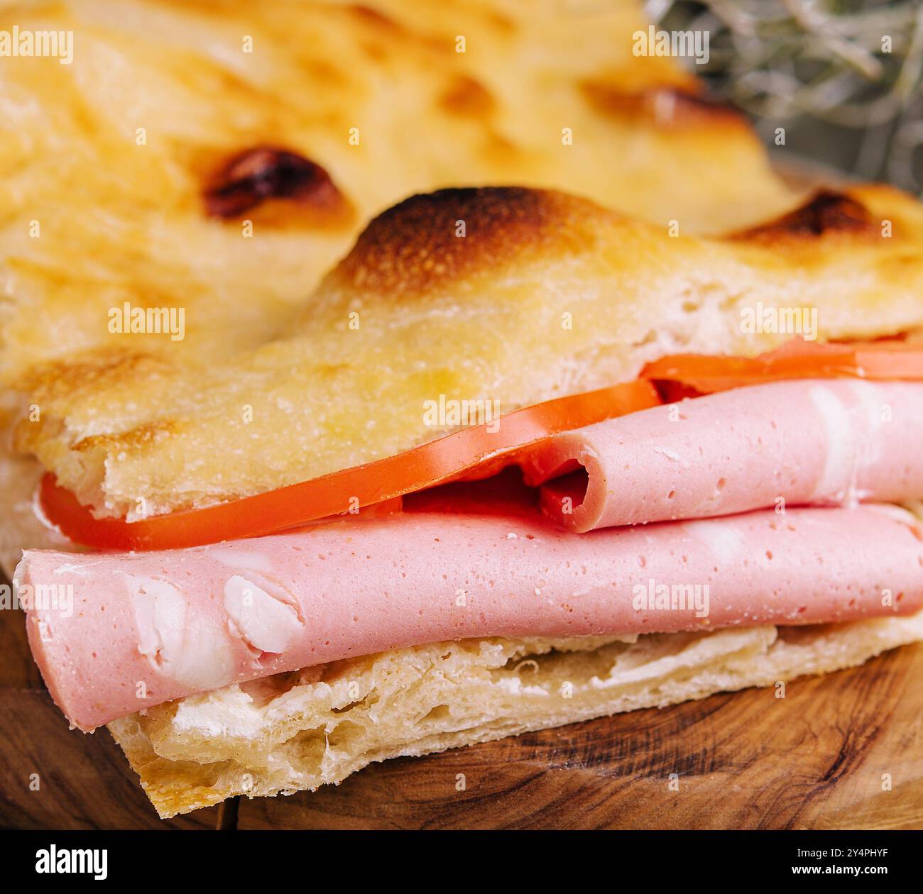 Fried pita bread with ham close up Stock Photo - Alamy