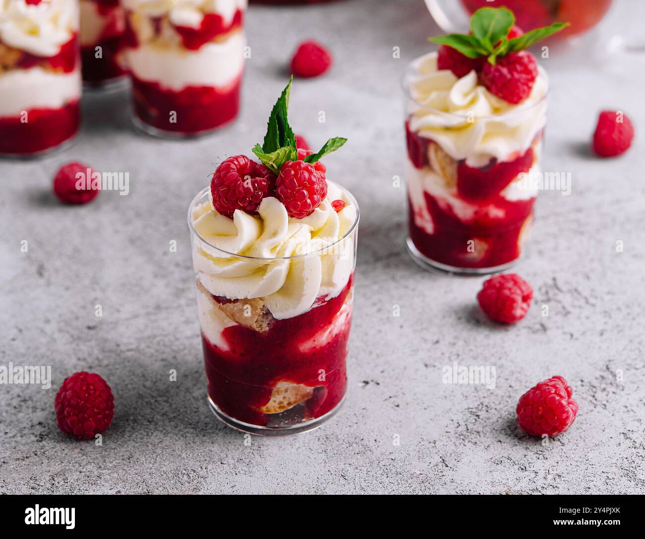 Layered dessert Trifle with vanilla cake, whipped cream and fresh ...