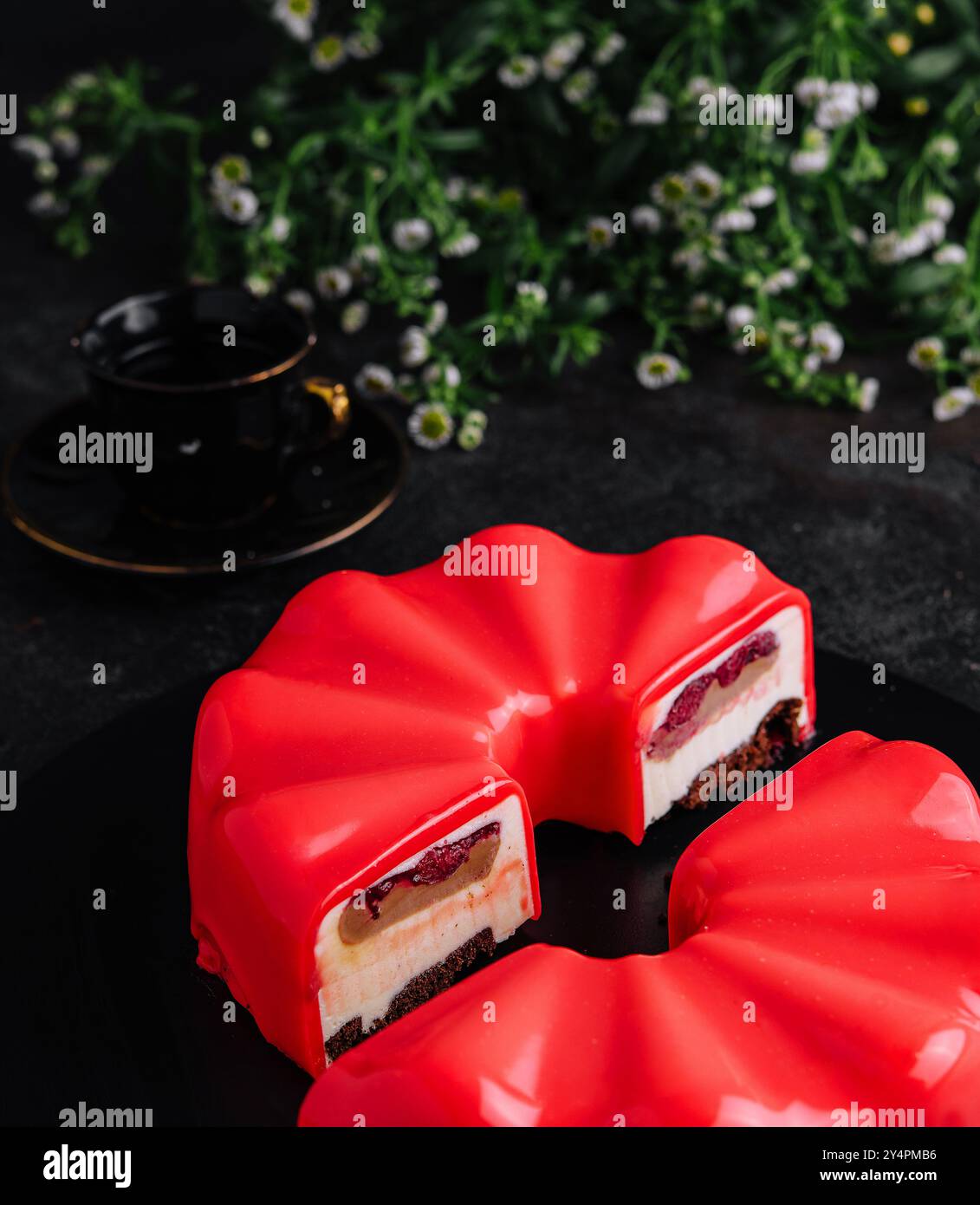 Contemporary Chocolate Cherry Mousse Cake covered with cherry icing ...