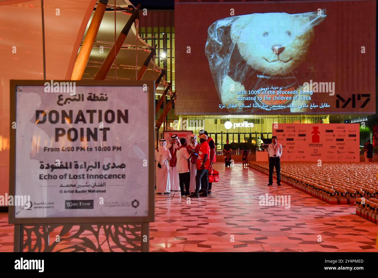 Doha, Qatar. 19th Sep, 2024. People visit the installation of teddy ...