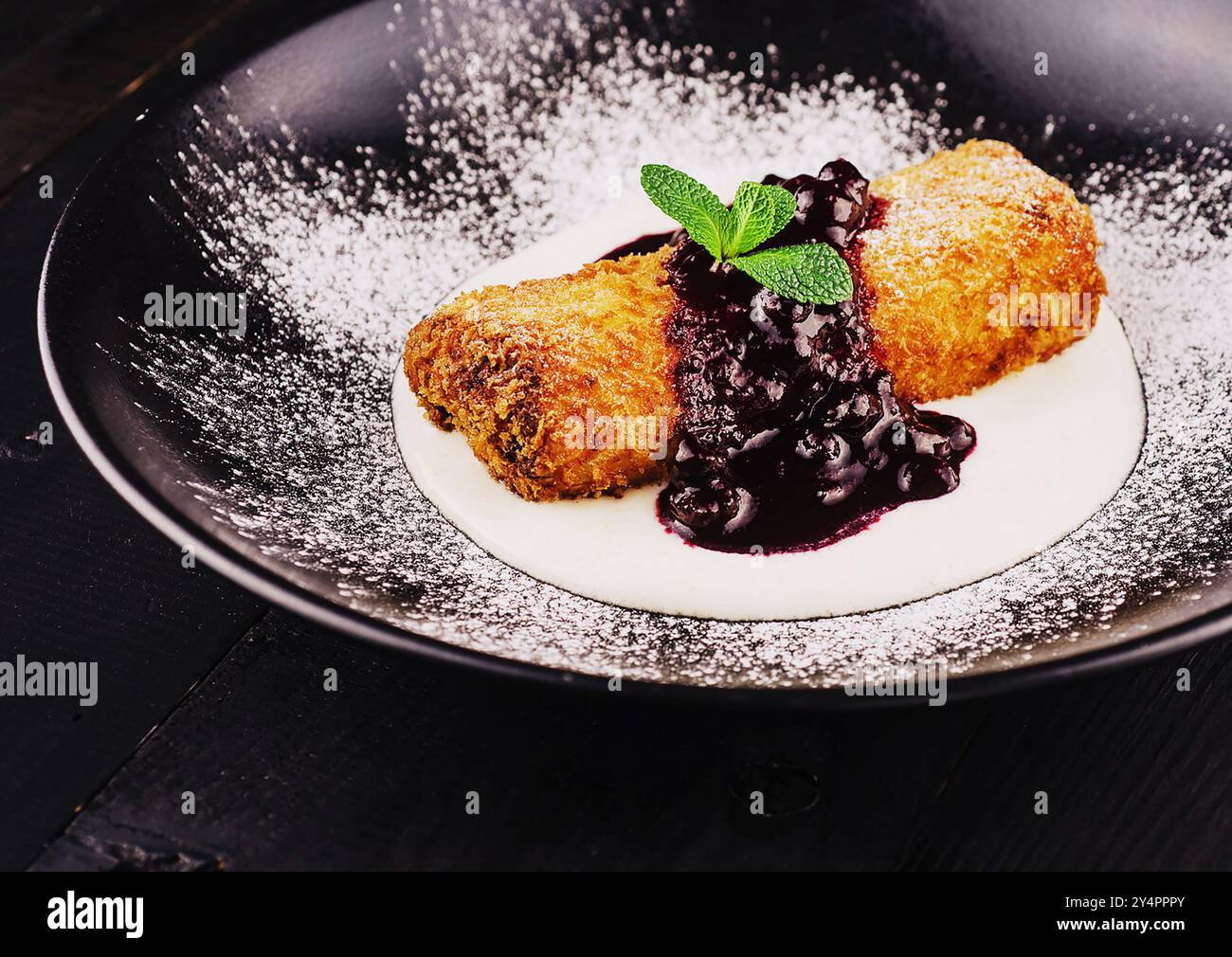 Puff pastry apple strudel with ice cream, served with cherry jam Stock ...