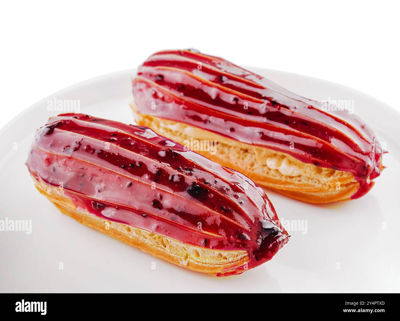 French eclairs isolated on a white background Stock Photo - Alamy