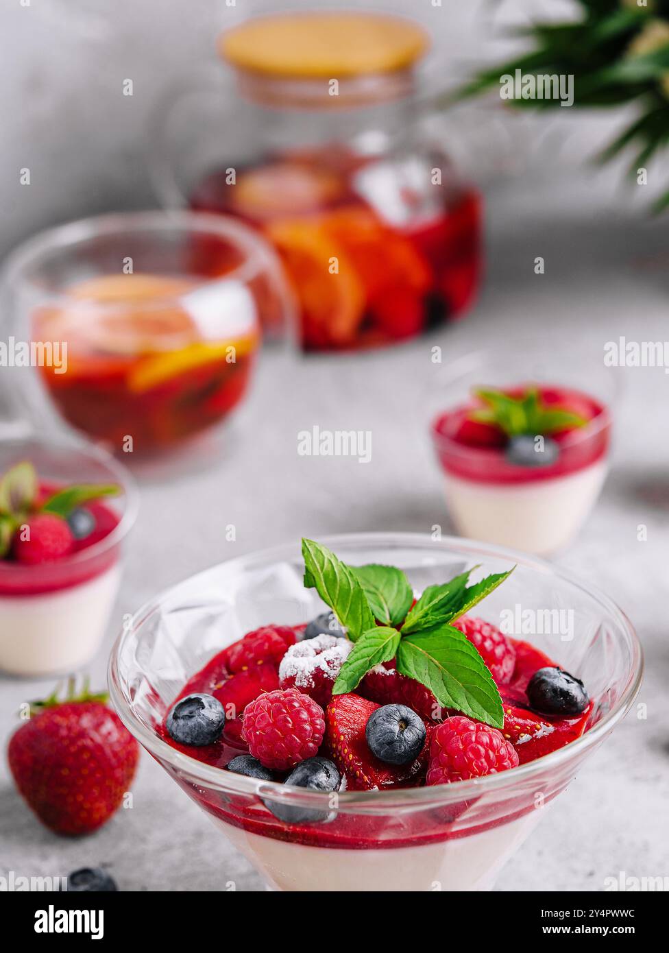 Italian dairy dessert panna cotta with raspberry jam Stock Photo - Alamy