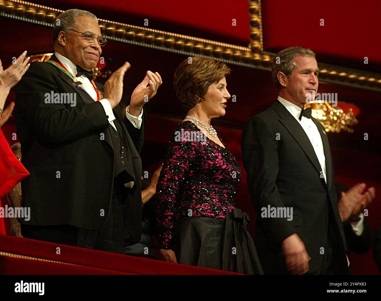 United States President George W. Bush (R) and First Lady Laura Bush ...