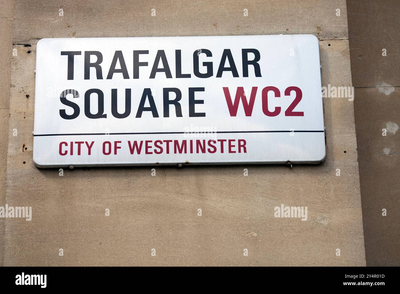 A sign indicating Trafalgar Square in the City of Westminster, an ...