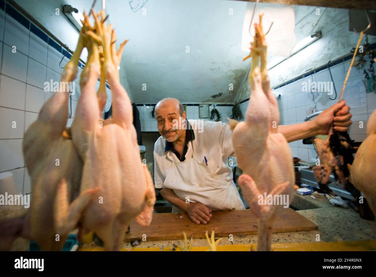 Chickens hanging in a street market hi-res stock photography and images ...