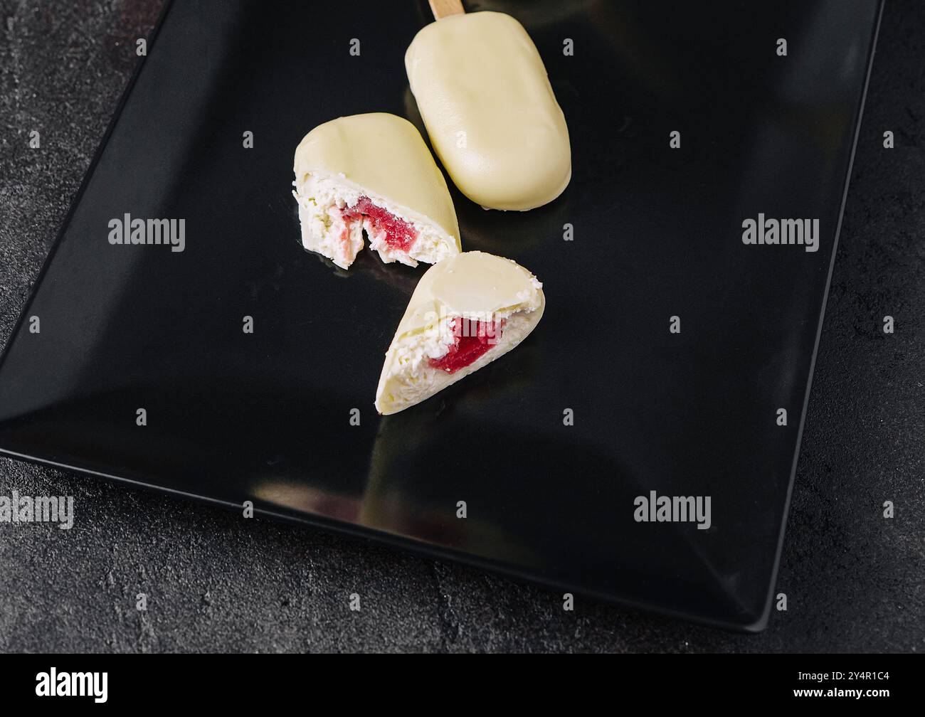 dessert from ice cream lolly with white chocolate coating Stock Photo ...