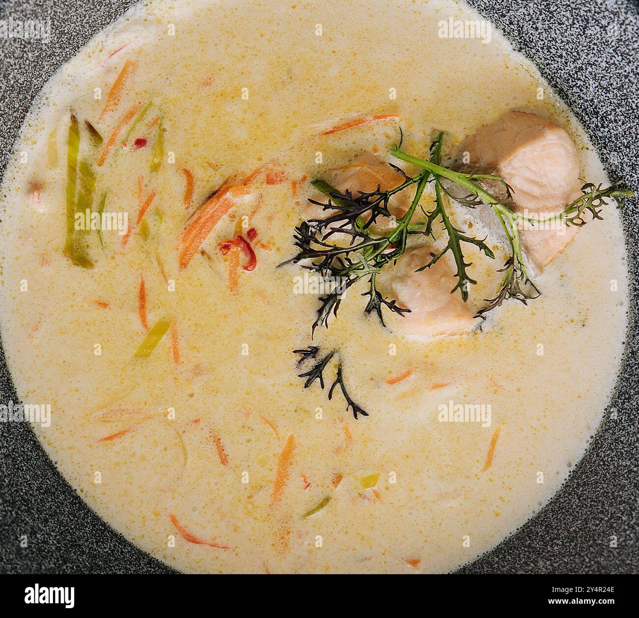 Salmon soup. creamy hearty salmon fish soup Stock Photo - Alamy