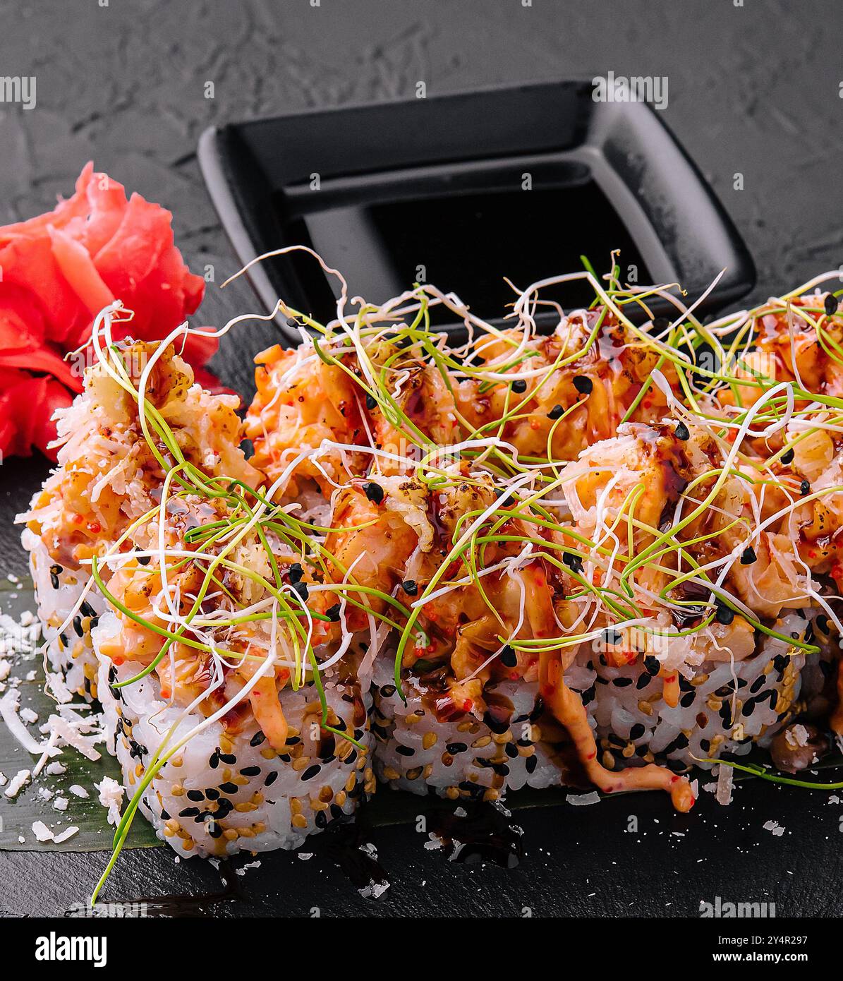 Beautiful spicy special volcano sushi roll Stock Photo - Alamy