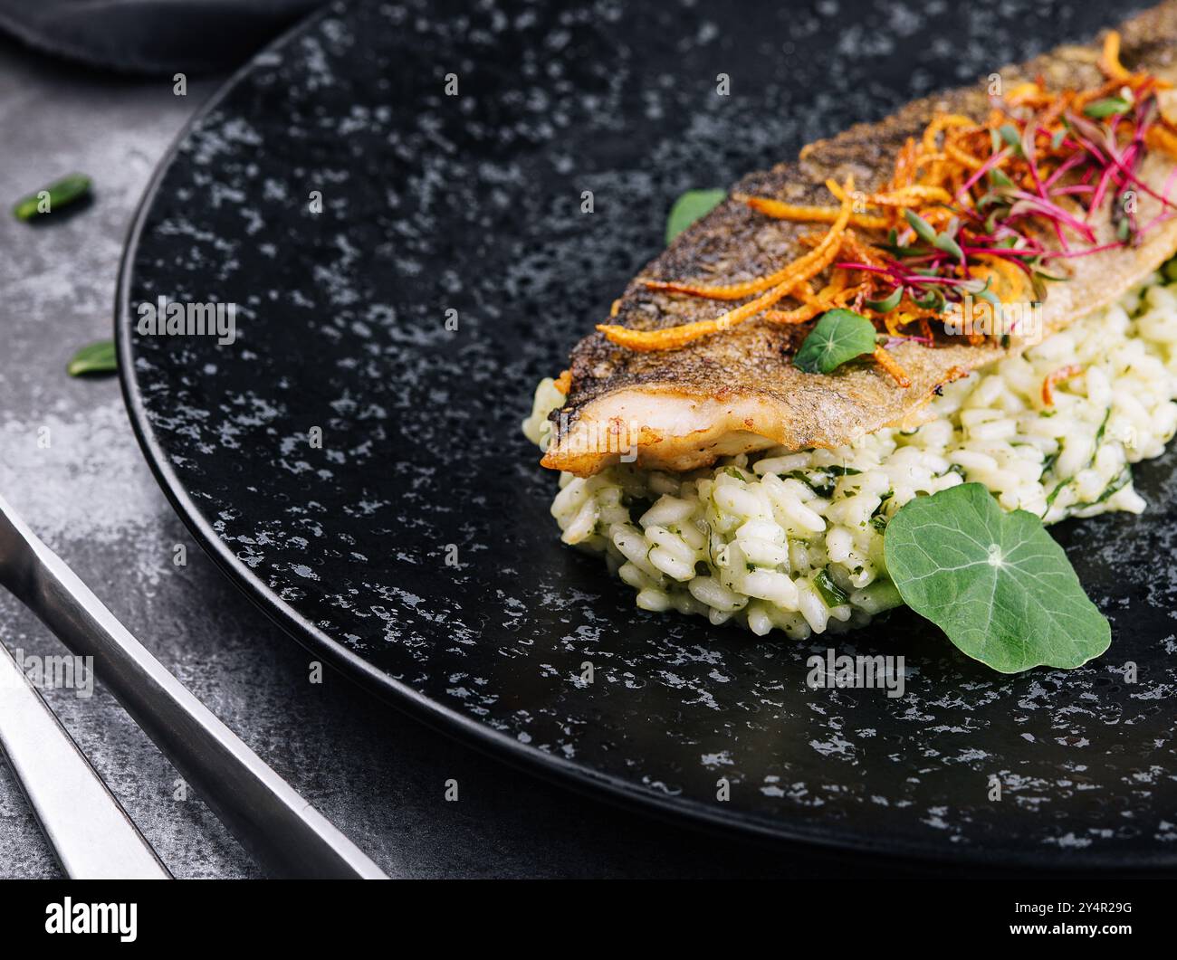 Baked white fish fillet served with steamed rice Stock Photo - Alamy