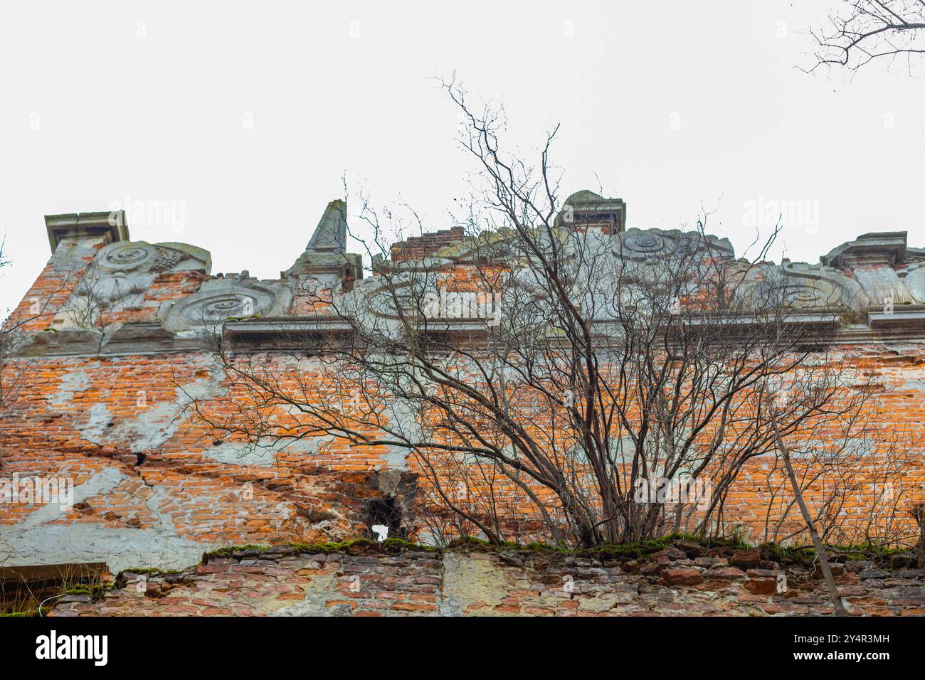 The old ruins of the collapsed walls with gates and windows ...