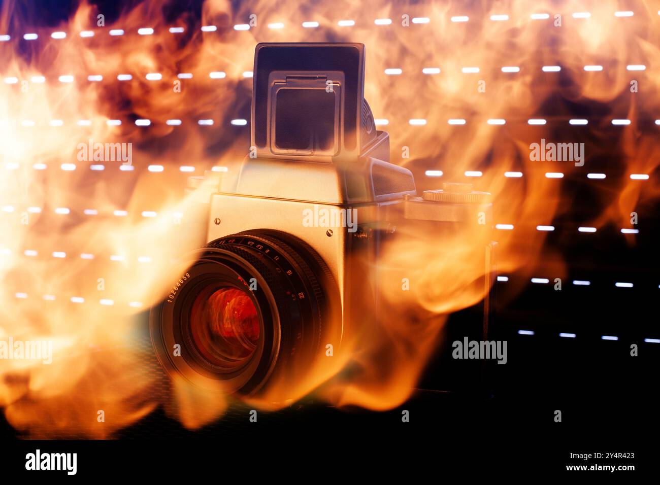 Vintage Camera Enveloped in Dramatic Flames Stock Photo - Alamy