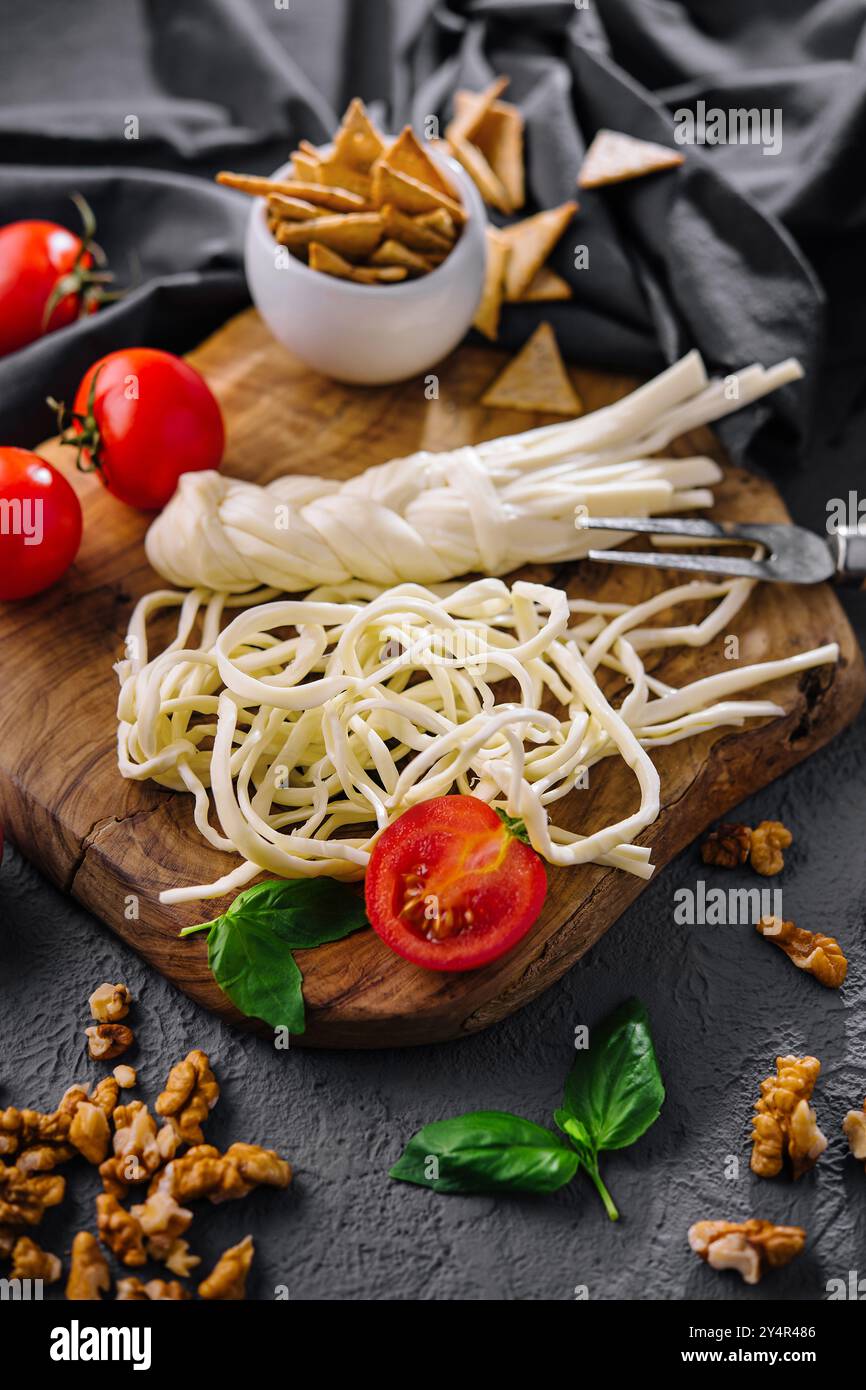 Traditional handmade Slovakian korbacik string Cheese Stock Photo - Alamy