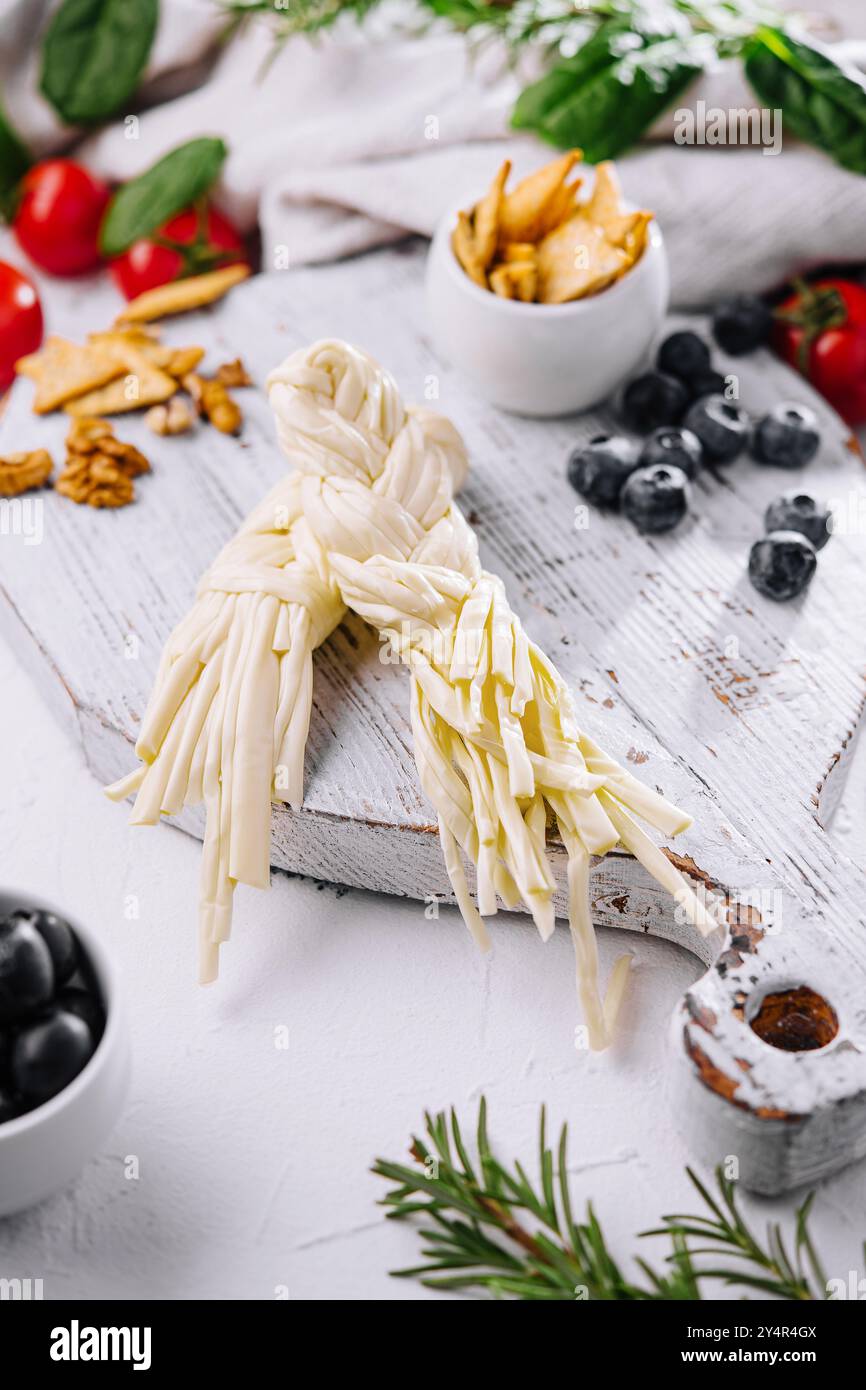 Traditional handmade Slovakian korbacik string Cheese Stock Photo - Alamy