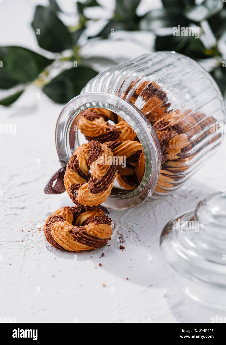 Chocolate cookies in a glass jar opened Stock Photo - Alamy