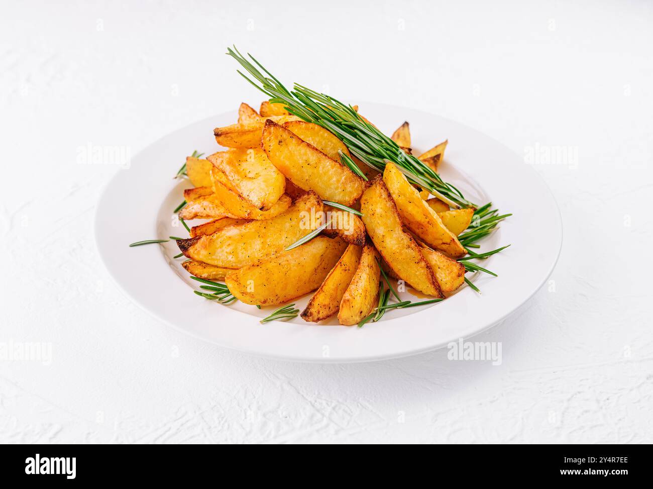 Crispy spiced potato wedges hi-res stock photography and images - Alamy