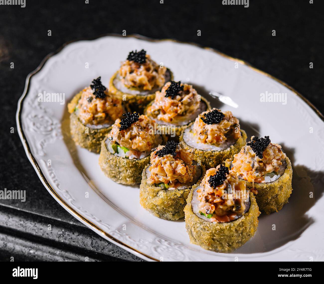 Warm sushi rolls with tempura cream cheese Stock Photo - Alamy