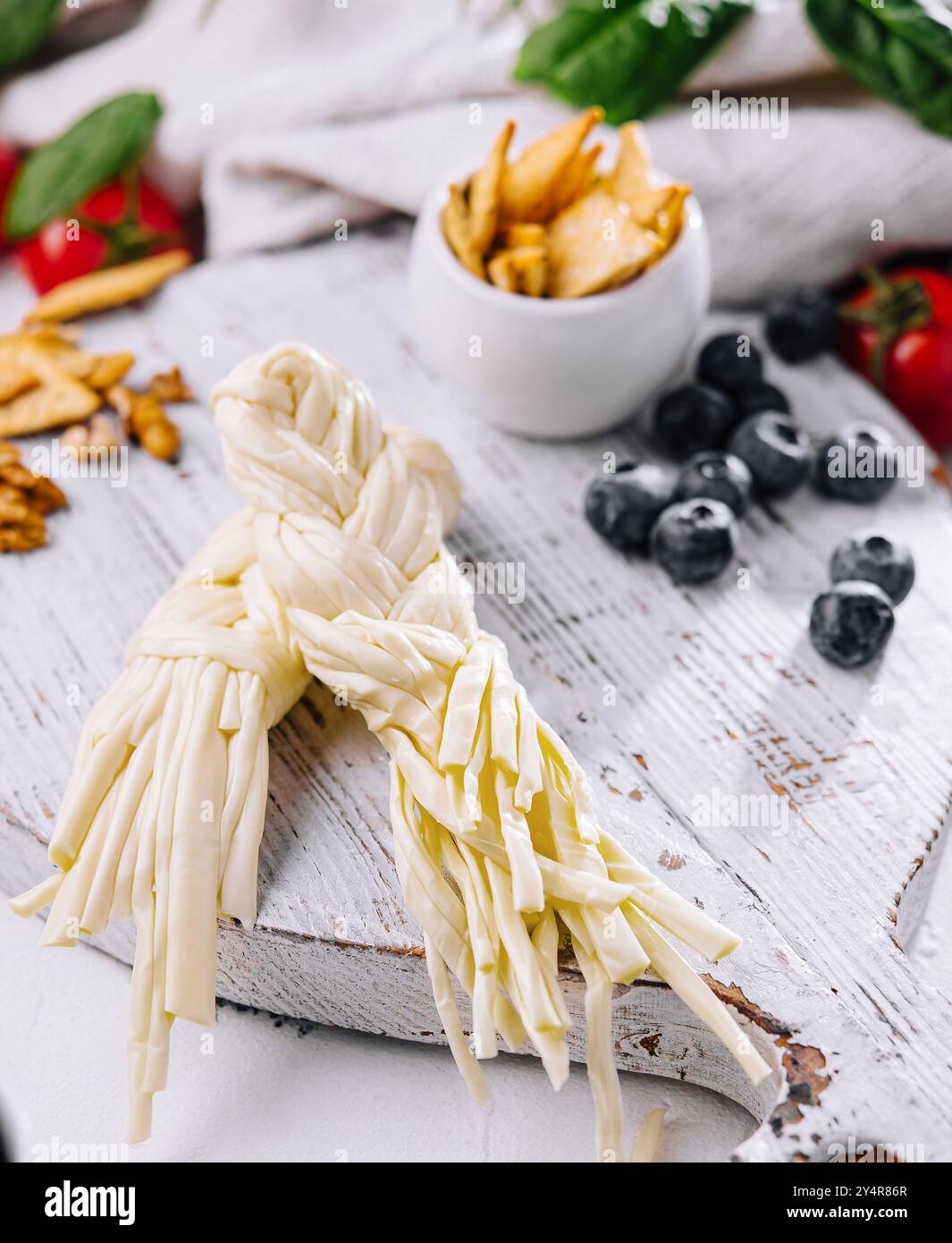 Traditional handmade Slovakian korbacik string Cheese Stock Photo - Alamy