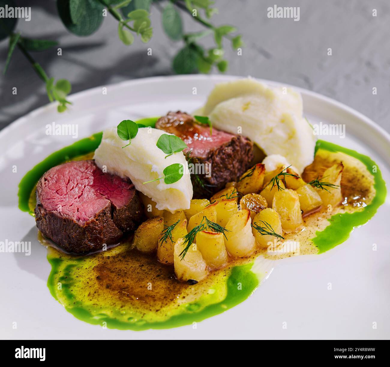 beef medallions with mashed potatoes and celery Stock Photo - Alamy