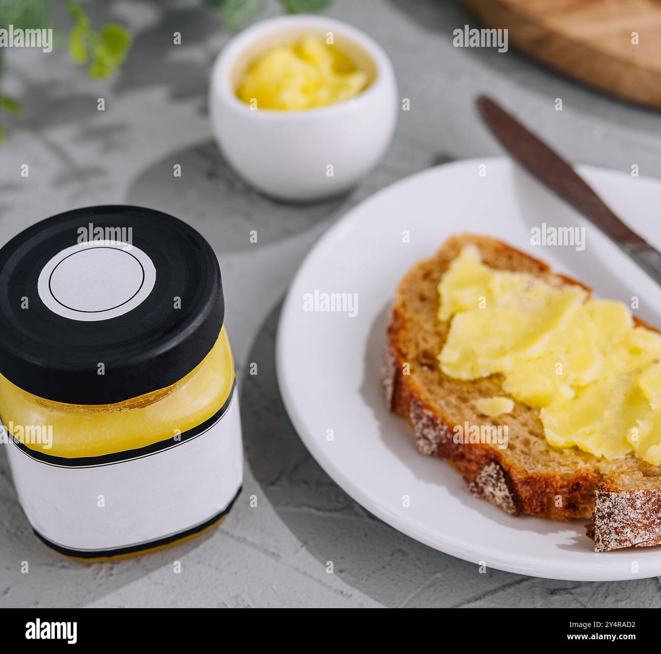 bread and melted butter for breakfast Stock Photo - Alamy