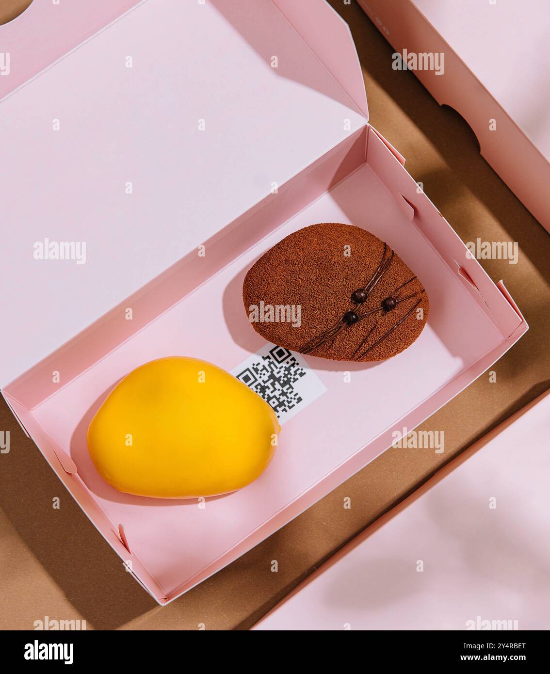 Contemporary chocolate mini mousse cakes in box Stock Photo - Alamy