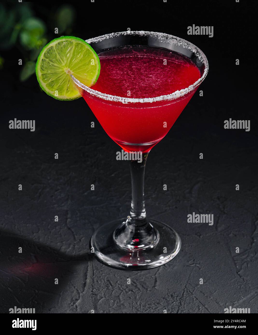 martini glasses of red alcohol drink on stone Stock Photo - Alamy