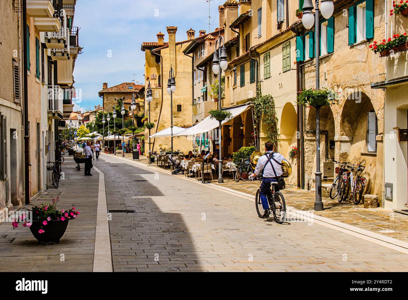 GRADO, ITALY – JUNE 2, 2024: Central street in Grado, a charming ...