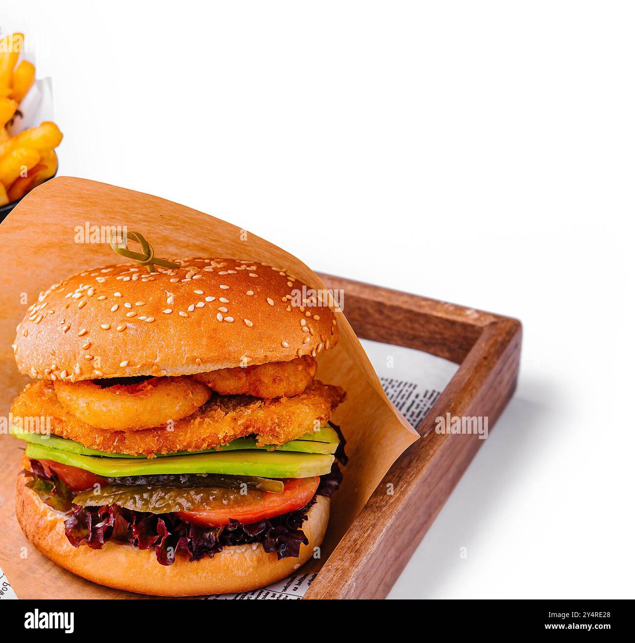 Gourmet seafood codfish burger with fish fillets dressed Stock Photo ...