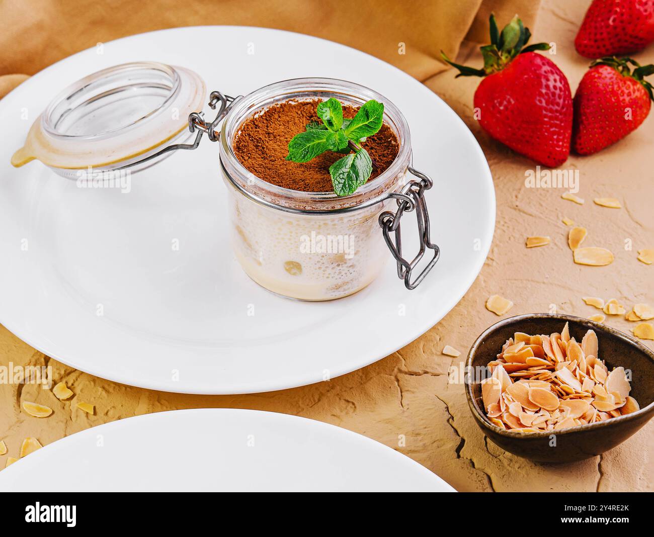 tiramisu in a glass jar top view Stock Photo - Alamy